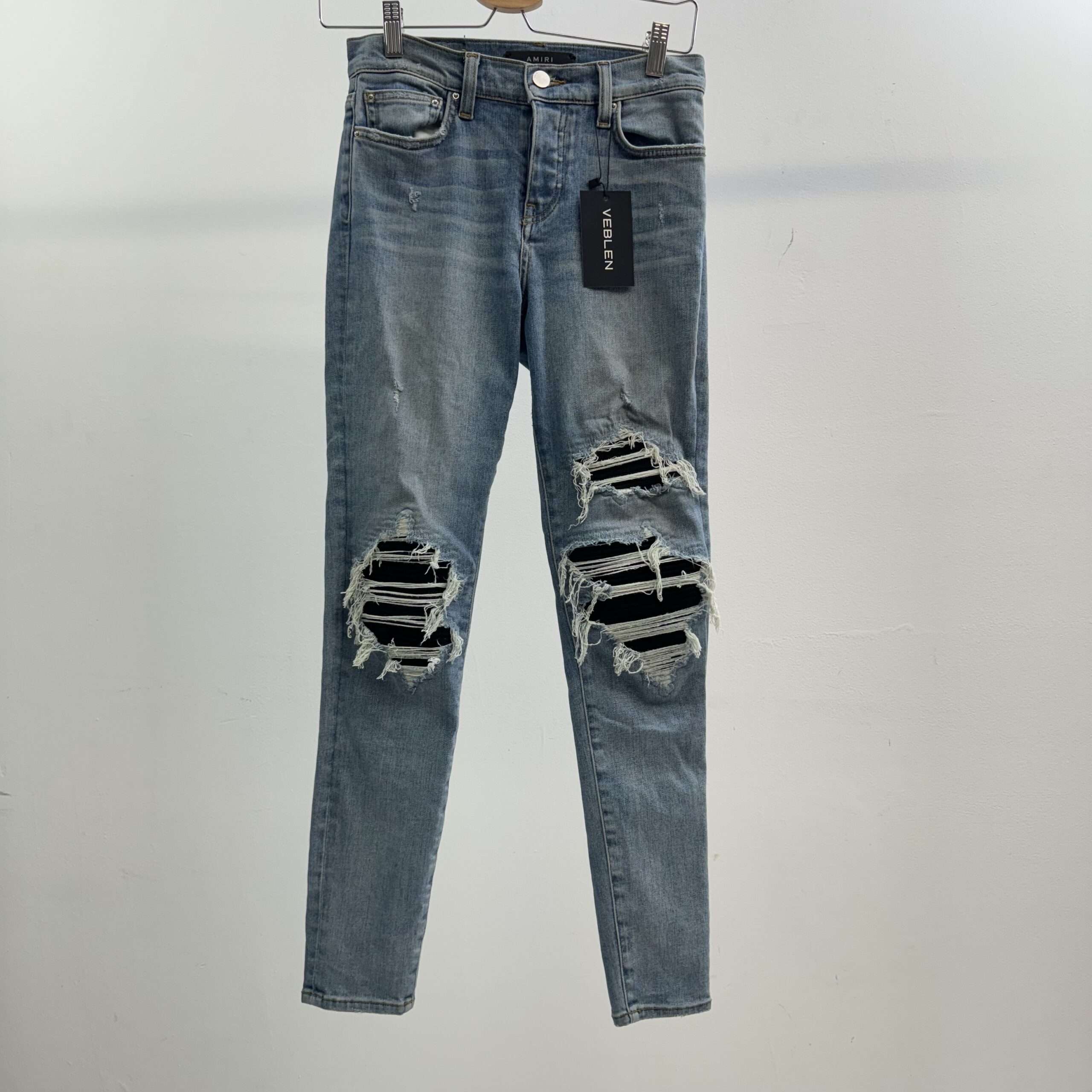 Amiri Distressed Leather Patch Jeans - Veblen